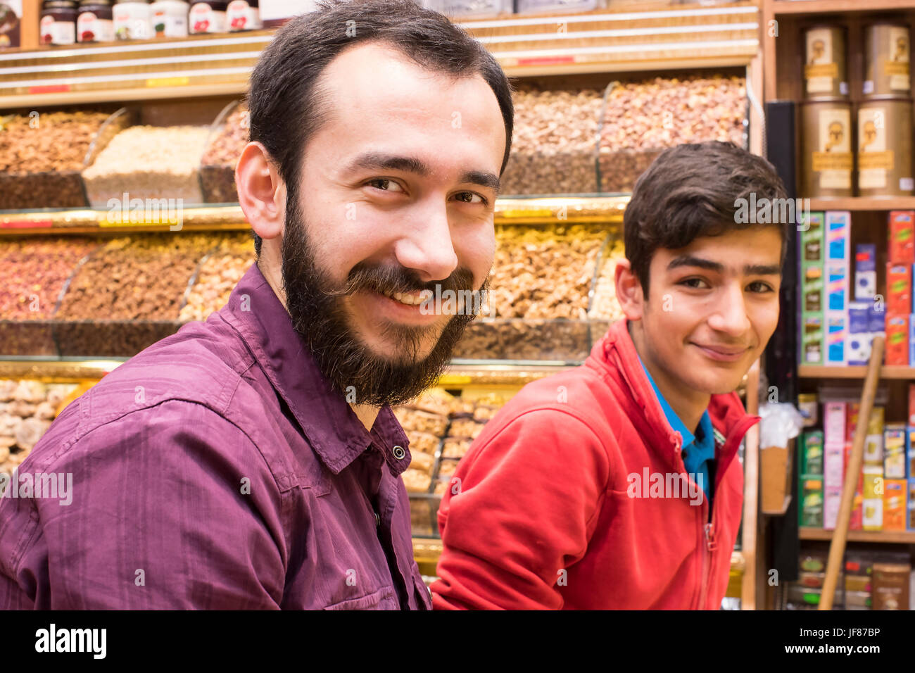 ISTANBUL, TURKEY - 7 APRIL , 2017: Sellers of spices and sweets in the ...