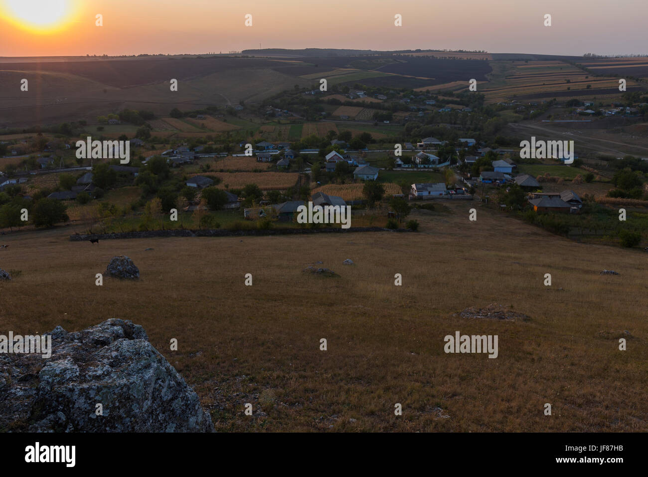 Beautiful rural landscape. Small village on the hillside Stock Photo ...