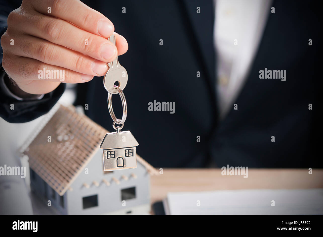 handing over house keys Stock Photo - Alamy