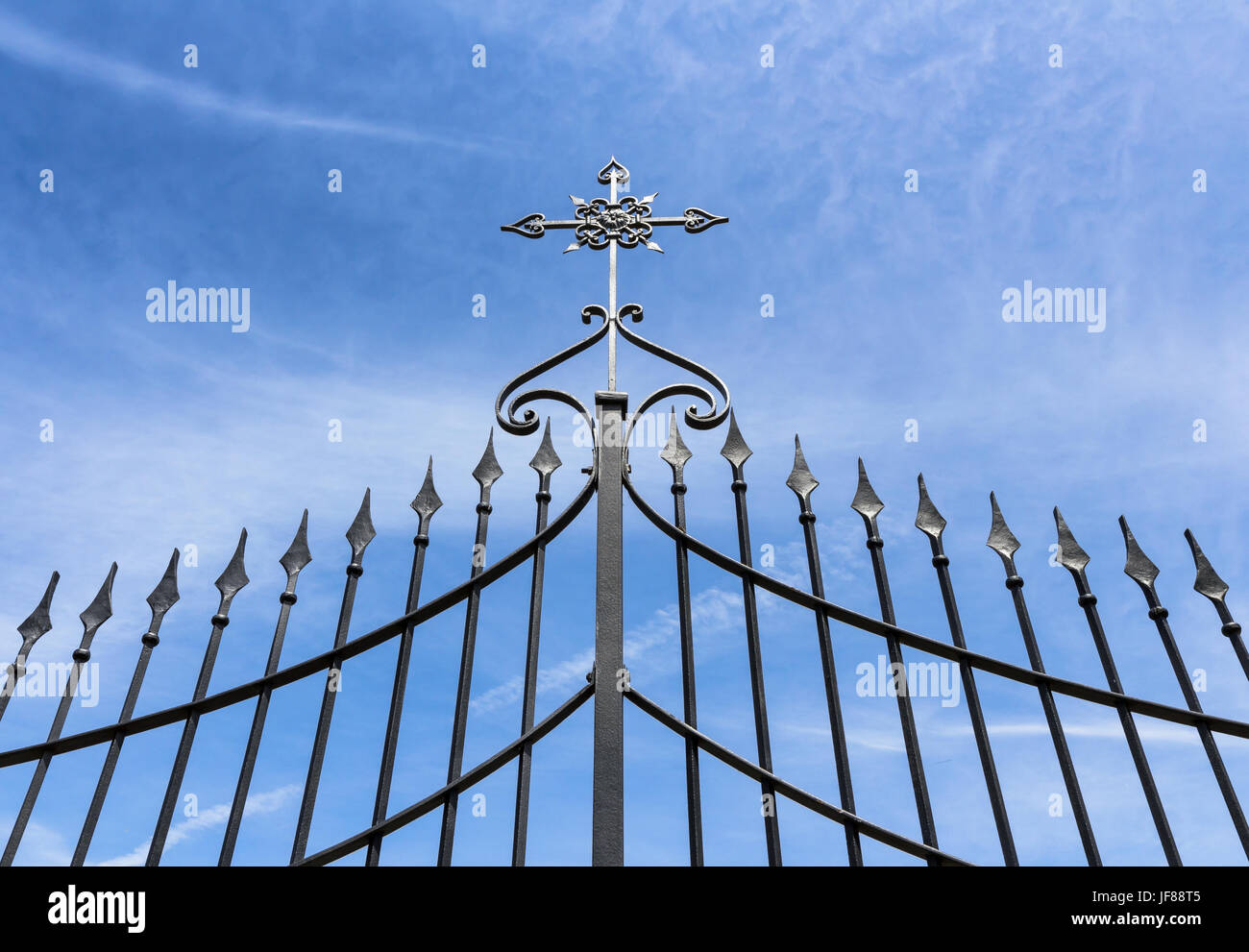 Cross metal iron gate hi-res stock photography and images - Alamy