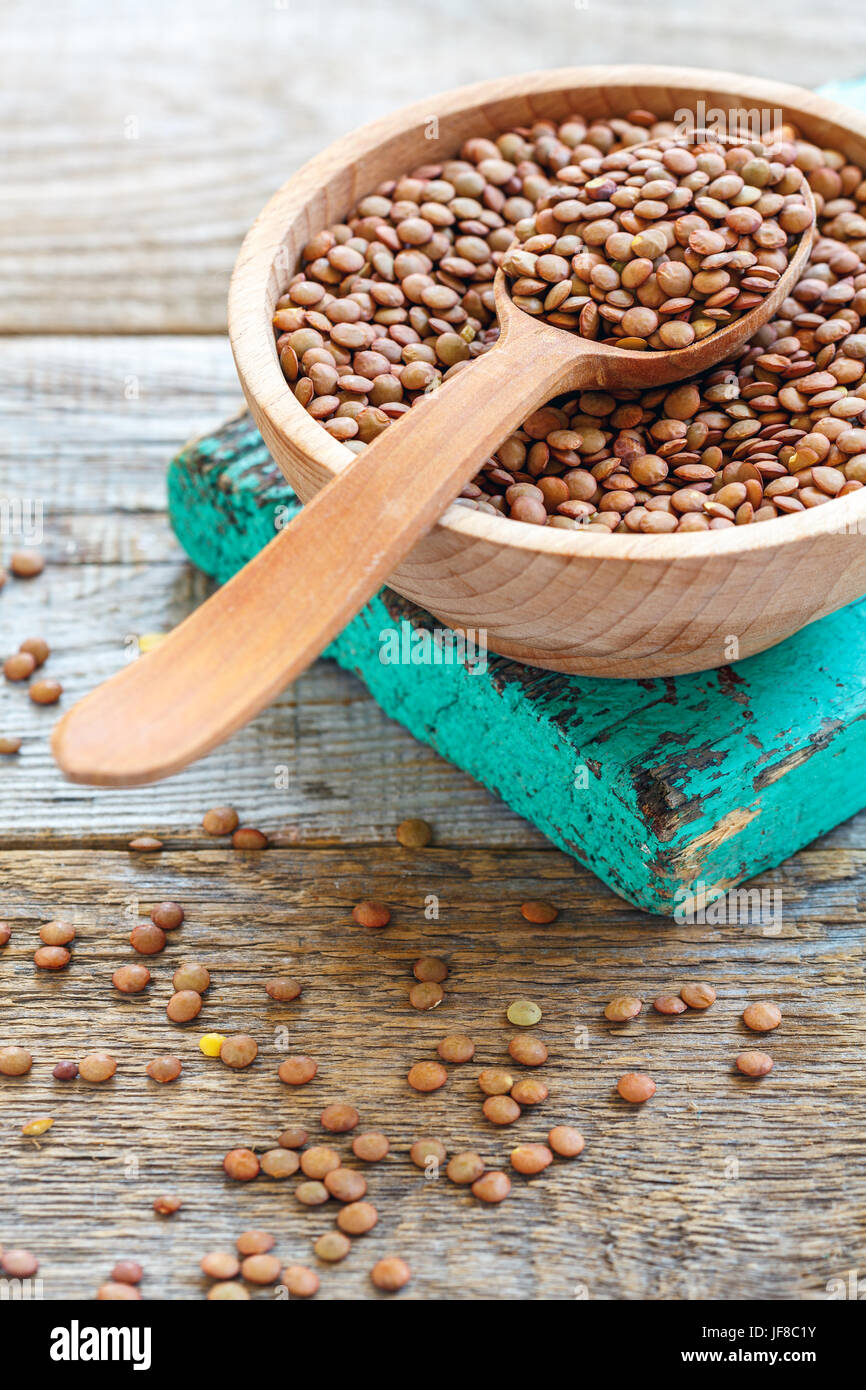 Raw lentil in bowl hi-res stock photography and images - Alamy