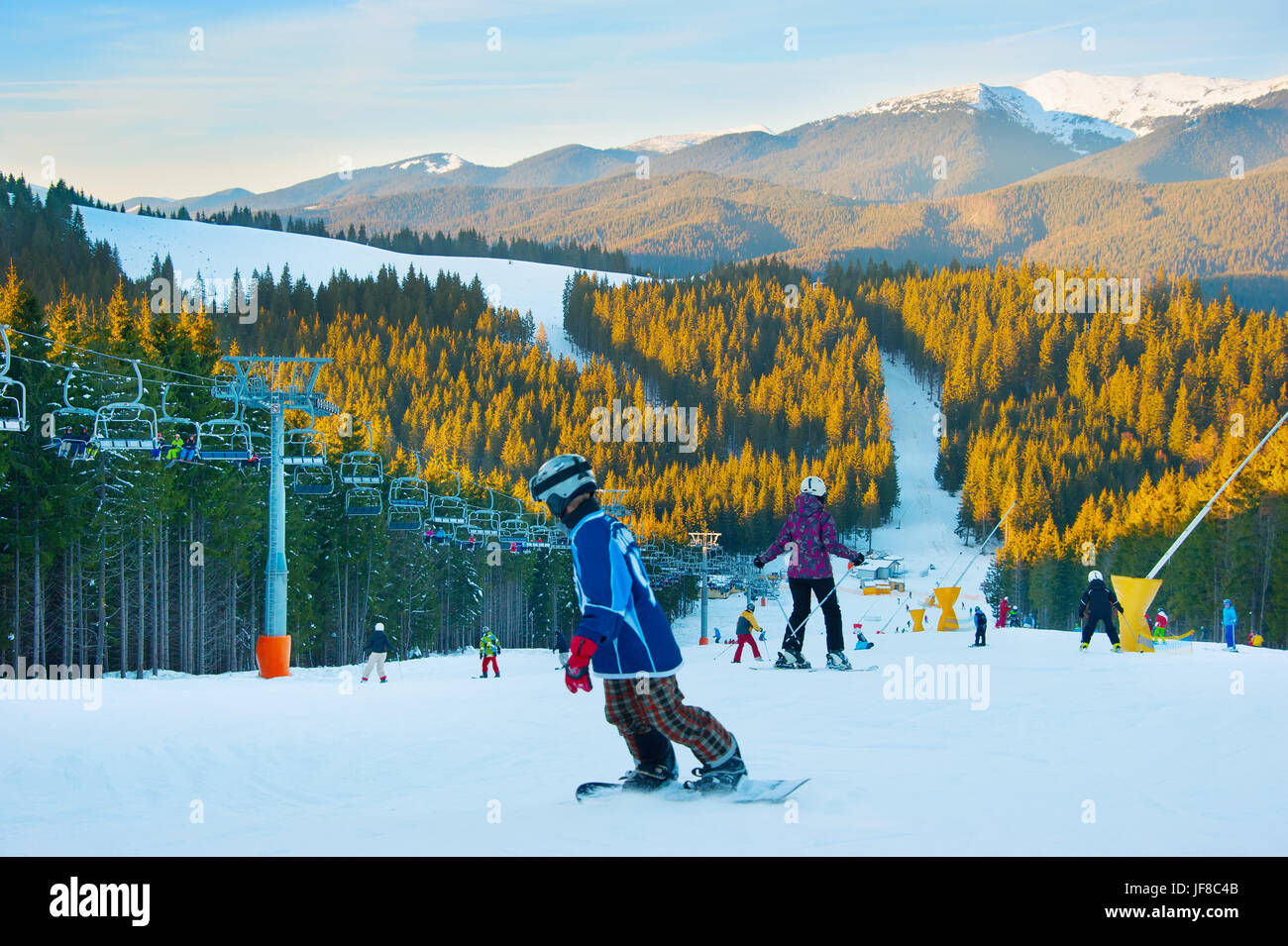 Ski resort at sunset Stock Photo - Alamy