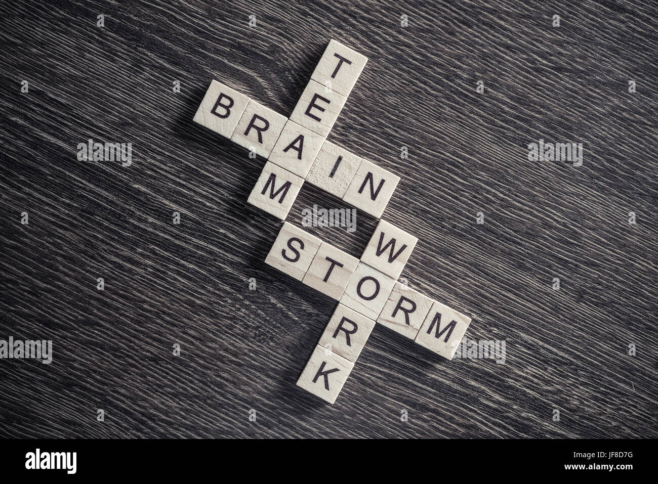 Words of business marketing collected in crossword with wooden cubes ...