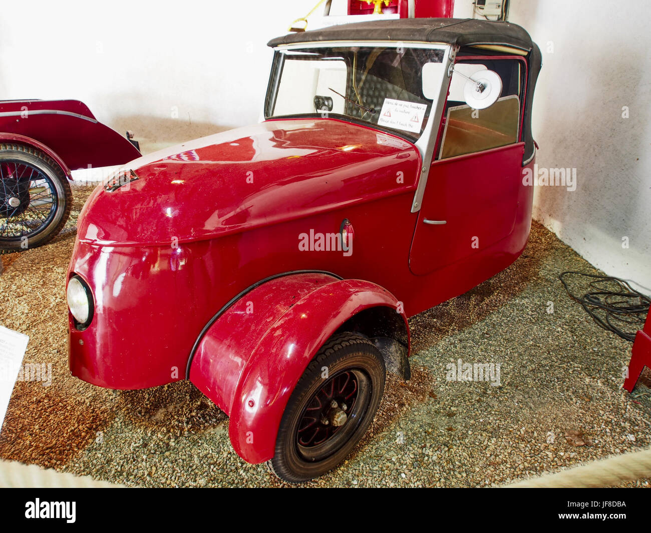 This 1941 Peugeot 12V electric vehicle, displayed at the Musée Maurice ...