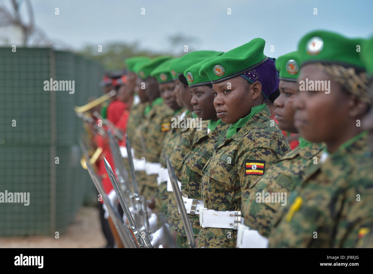 African Union soldiers stand ready to perform a Guard of Honor at the ...