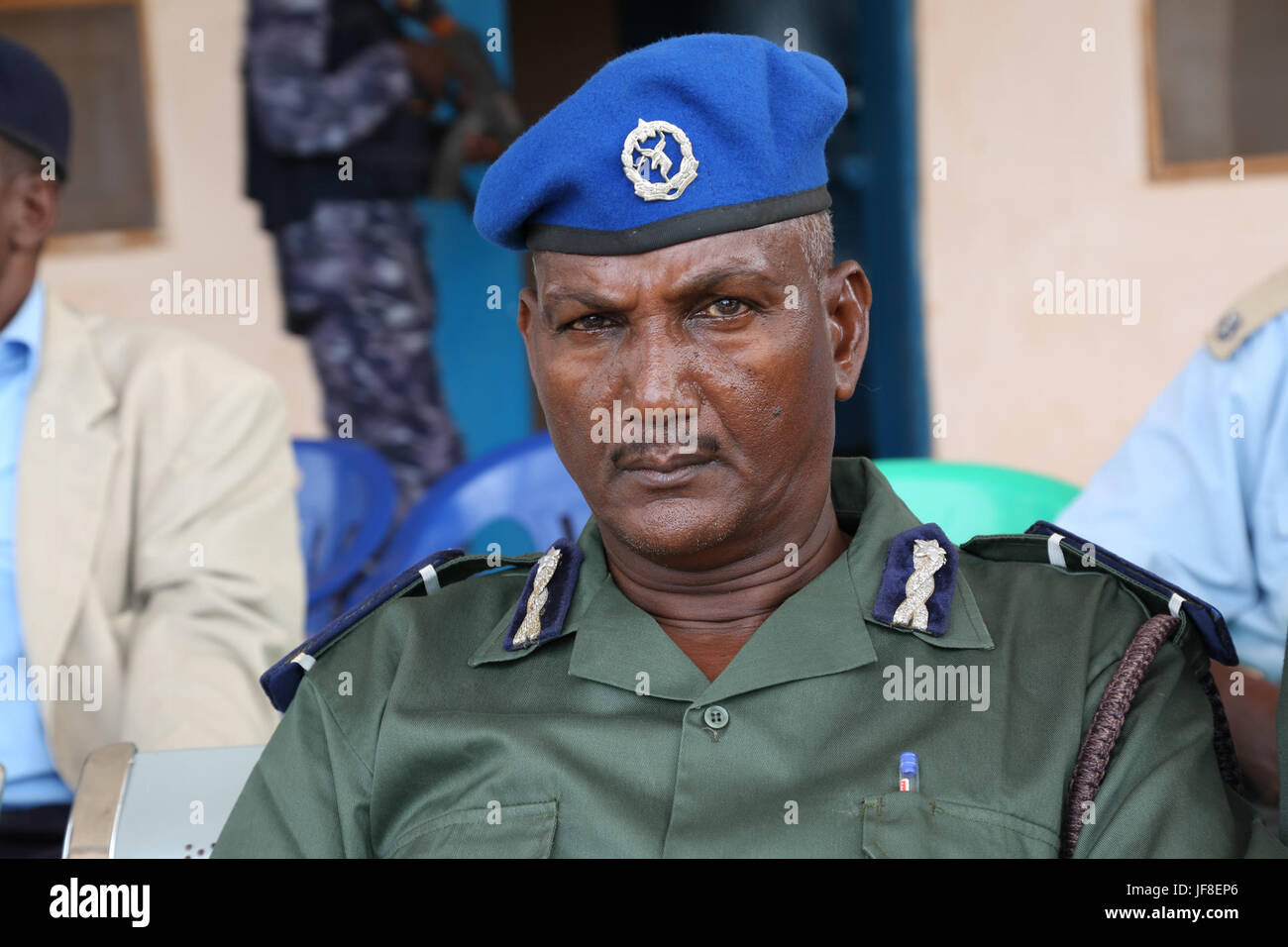 Colonel Ali Aden Hassan of the Somali Police Force attends a ceremony ...