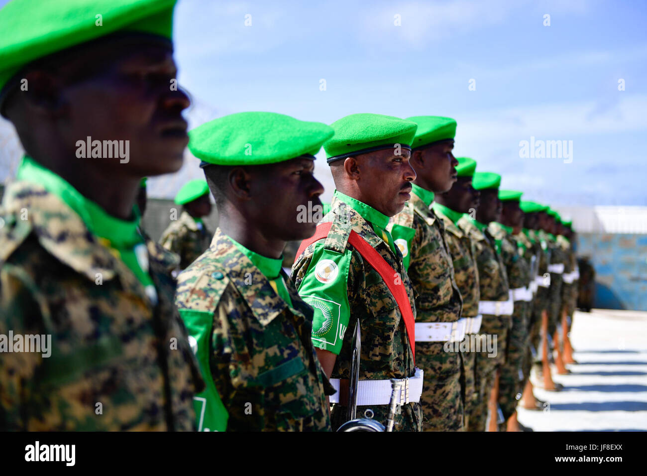 Ugandan soldiers serving with AMISOM mount a guard of honor at Sector ...