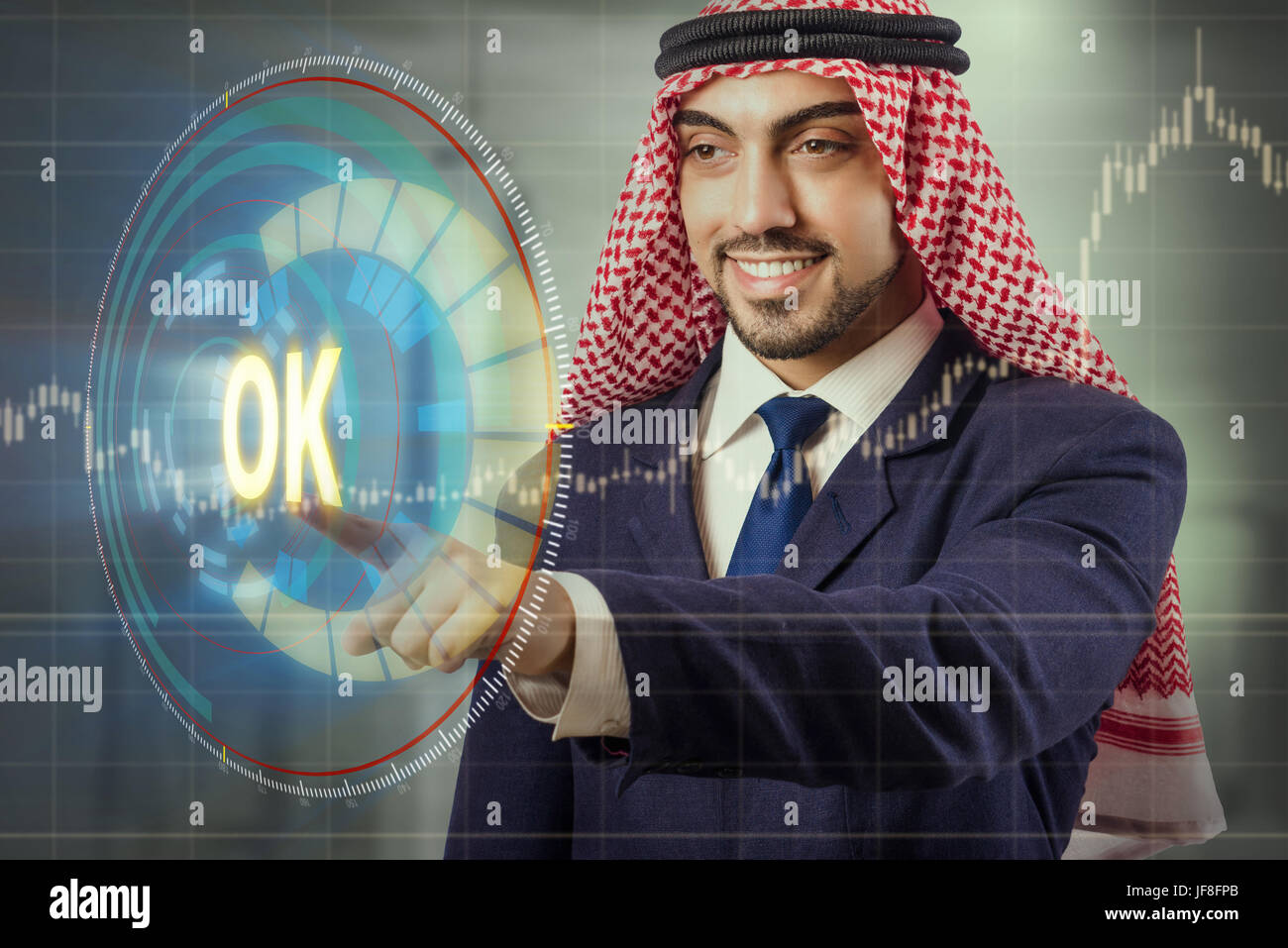 Arab man pressing ok button Stock Photo - Alamy