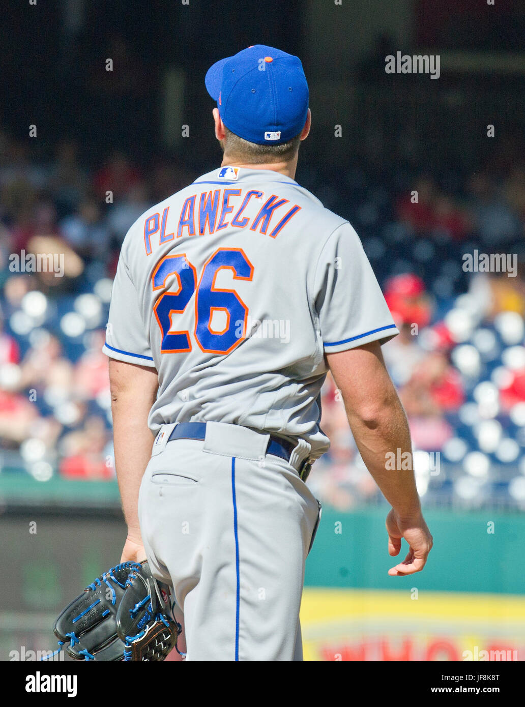 New York Mets catcher Kevin Plawecki (26), pitching in relief, watches ...