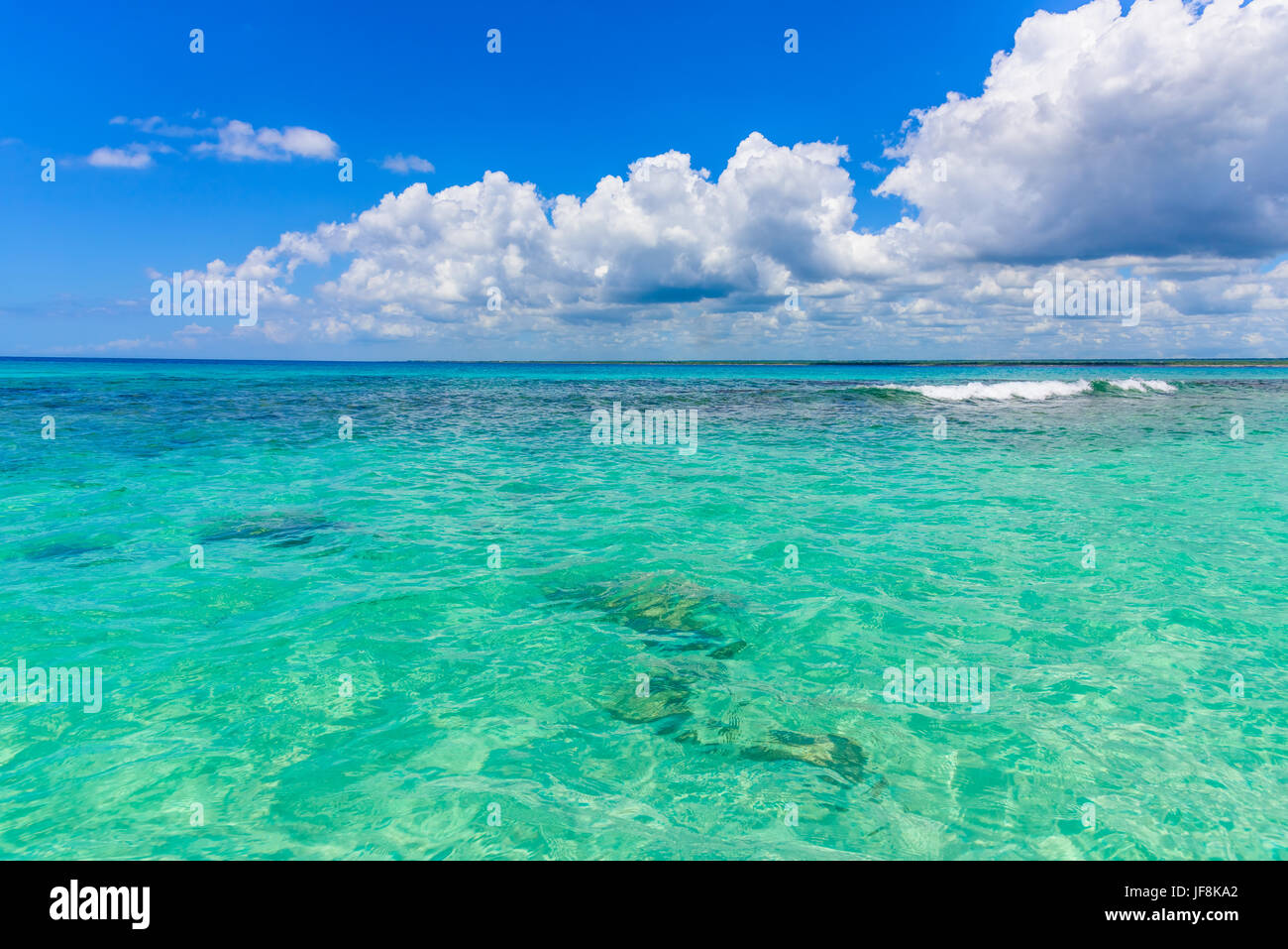 open blue sea cumulus clouds Stock Photo - Alamy