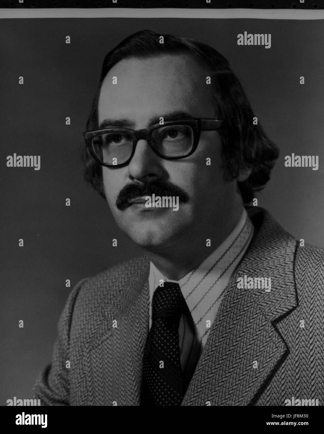 A historic photograph of Dr. James B. Rhoads, showcasing his ...