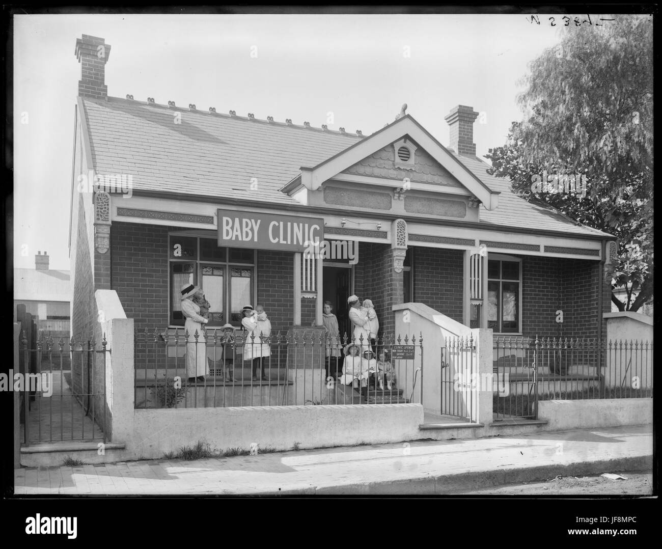 An exterior view of St. Peter's Baby Clinic, captured in black and ...