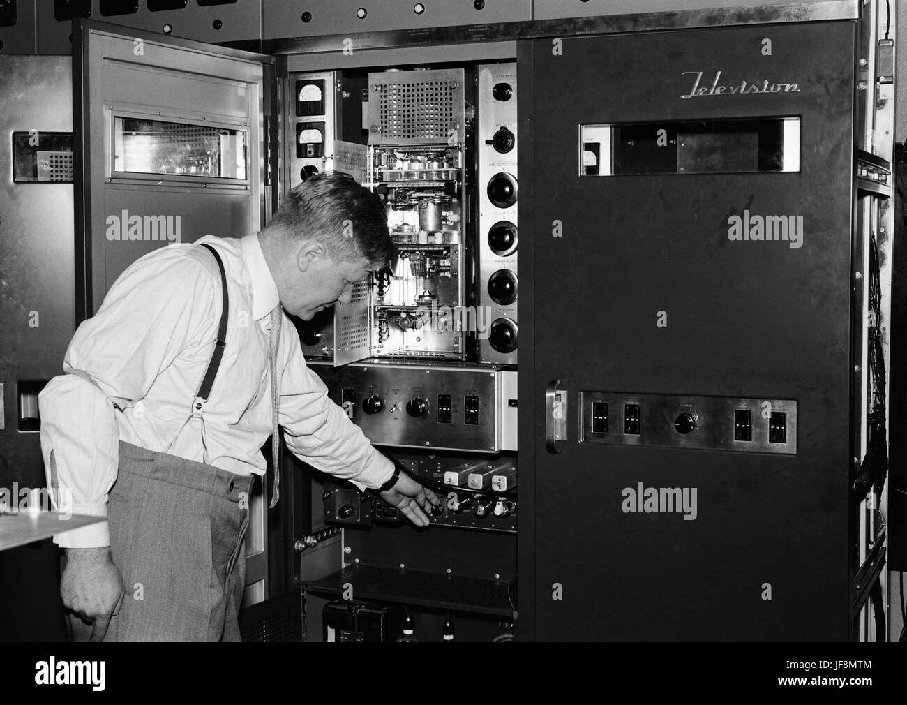 Engineer Lauri Häkkinen working with the RCA television transmitter, a ...