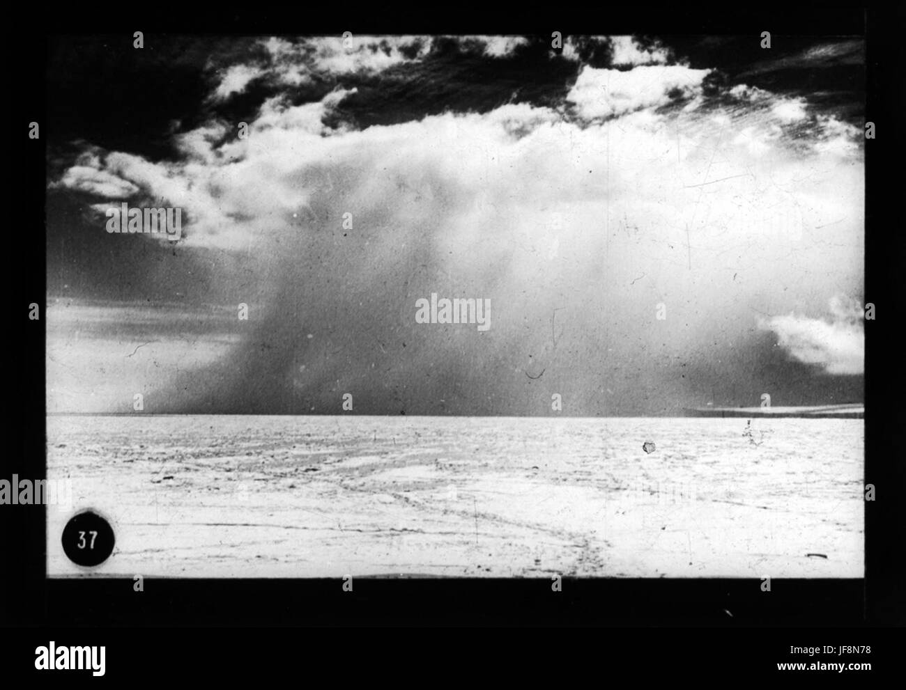 A dramatic photograph capturing an Antarctic wind storm, showcasing the ...