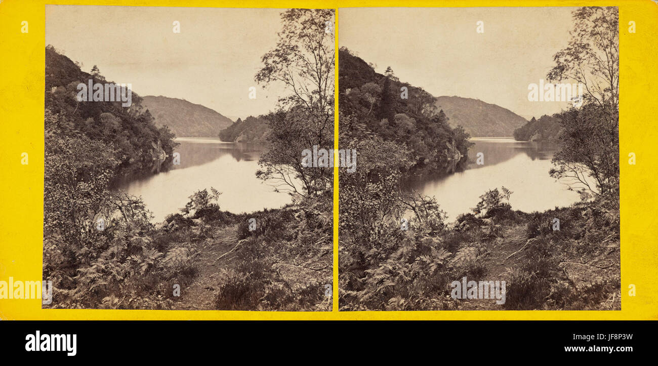 A photograph of Loch Katrine, known for its picturesque and serene ...