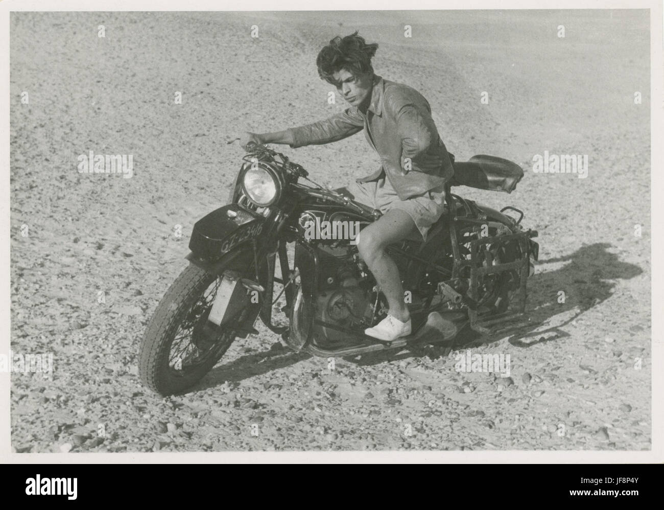 A moment in time captured during a motorcycle tour, showing a man ...