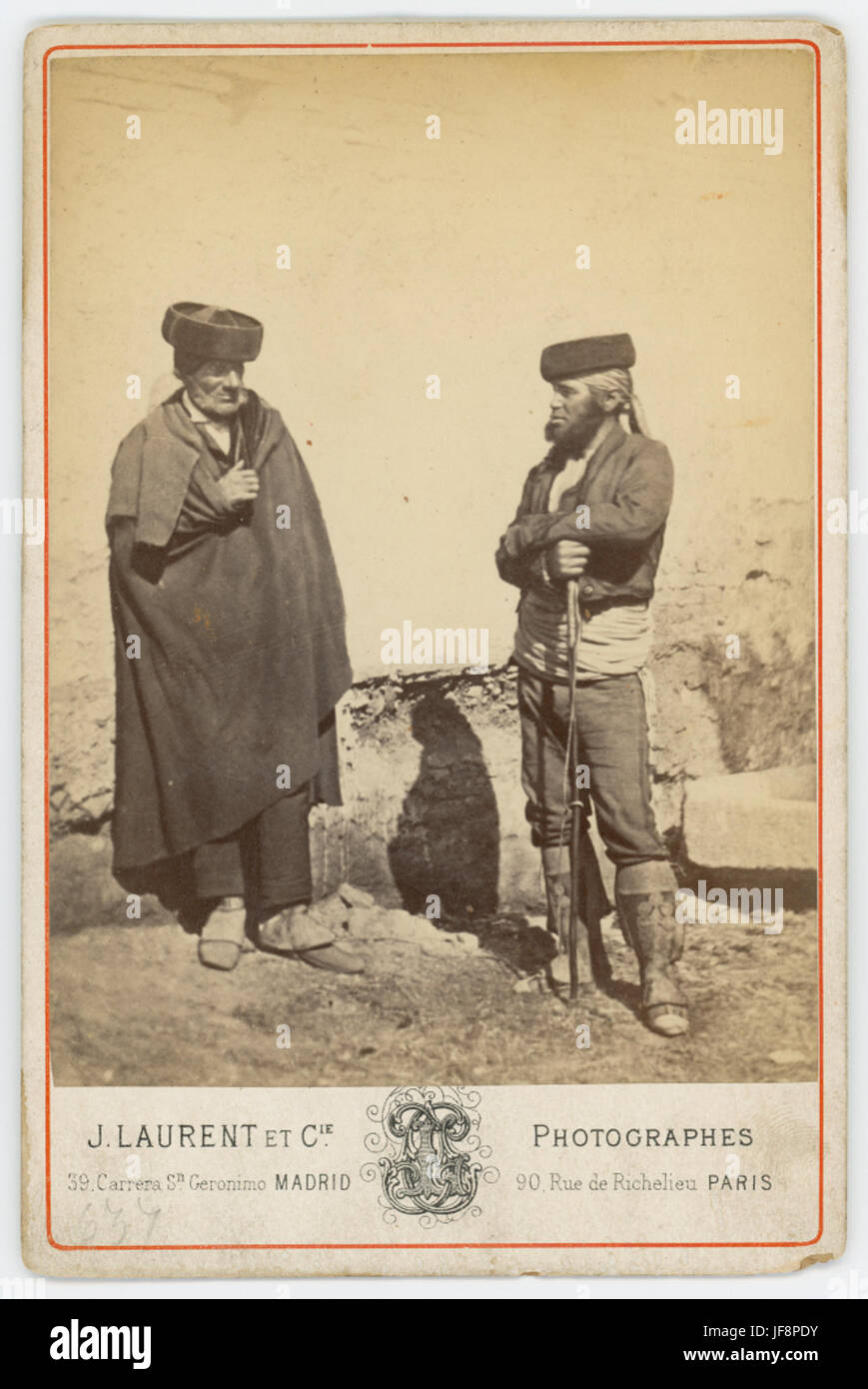 Two men engaged in a conversation, captured in a historical ...