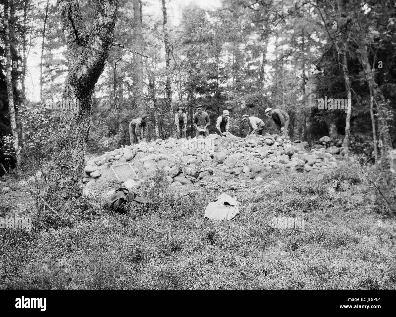 A prehistoric grave marked by a cairn in Södra Unnaryd, Småland, Sweden ...