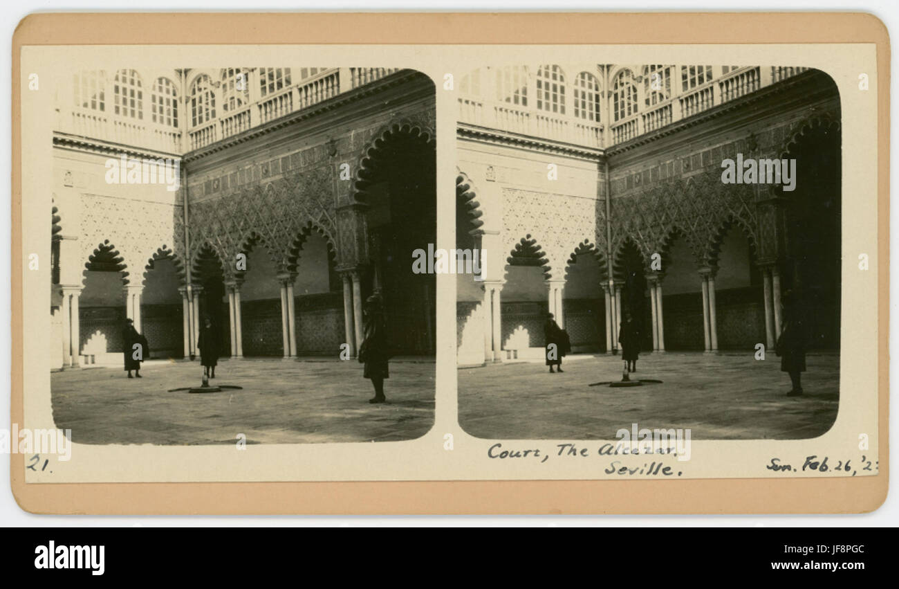 A majestic photograph of the court of the Alcázar of Seville, one of ...
