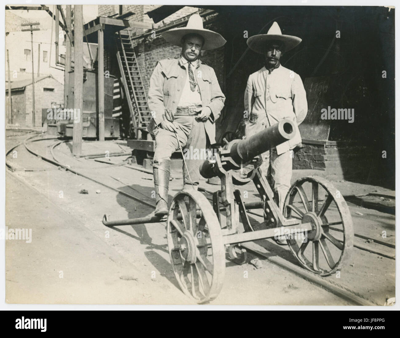 Two soldiers during the Mexican Revolution, captured with artillery in ...