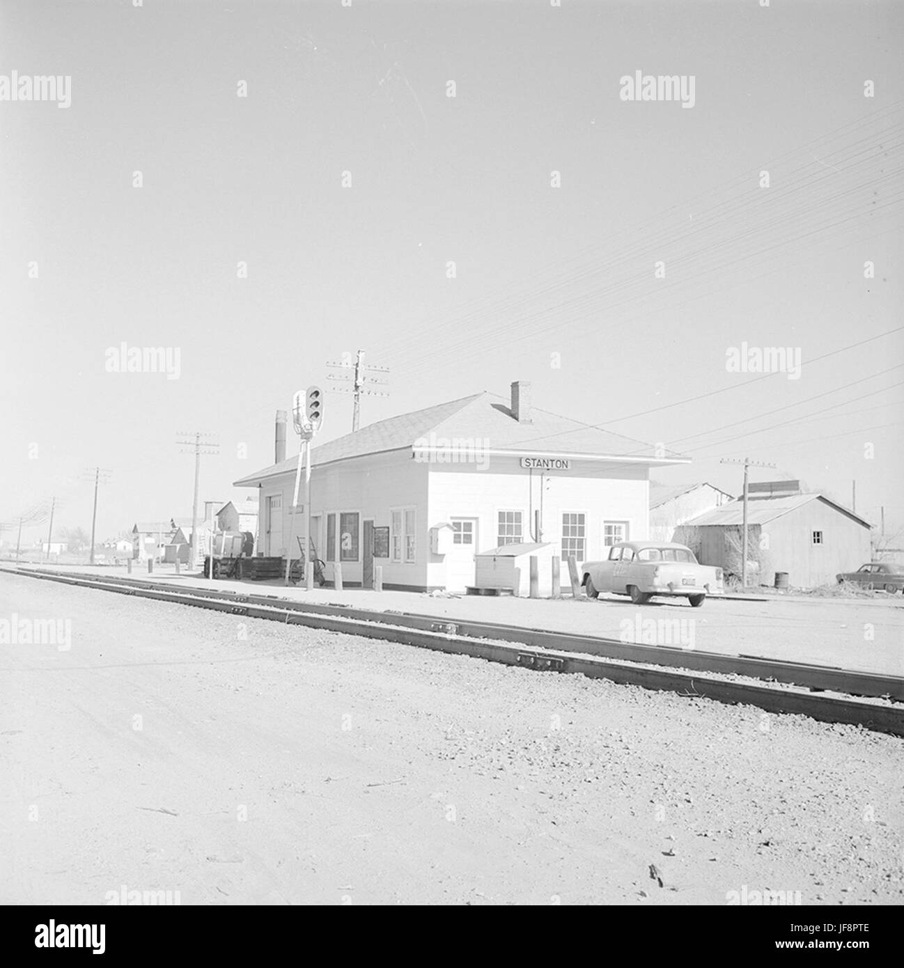 A historical photograph of the Texas and Pacific Railway Station in ...