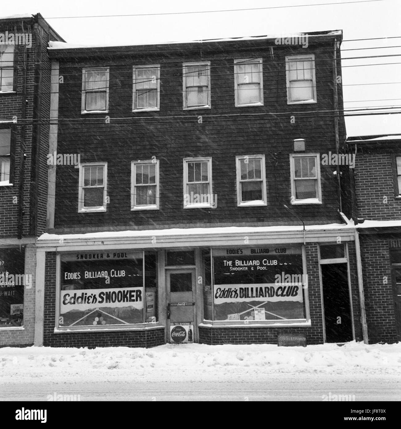 A vintage photograph of NuWay Drycleaners and Eddie's Billiard Club on ...