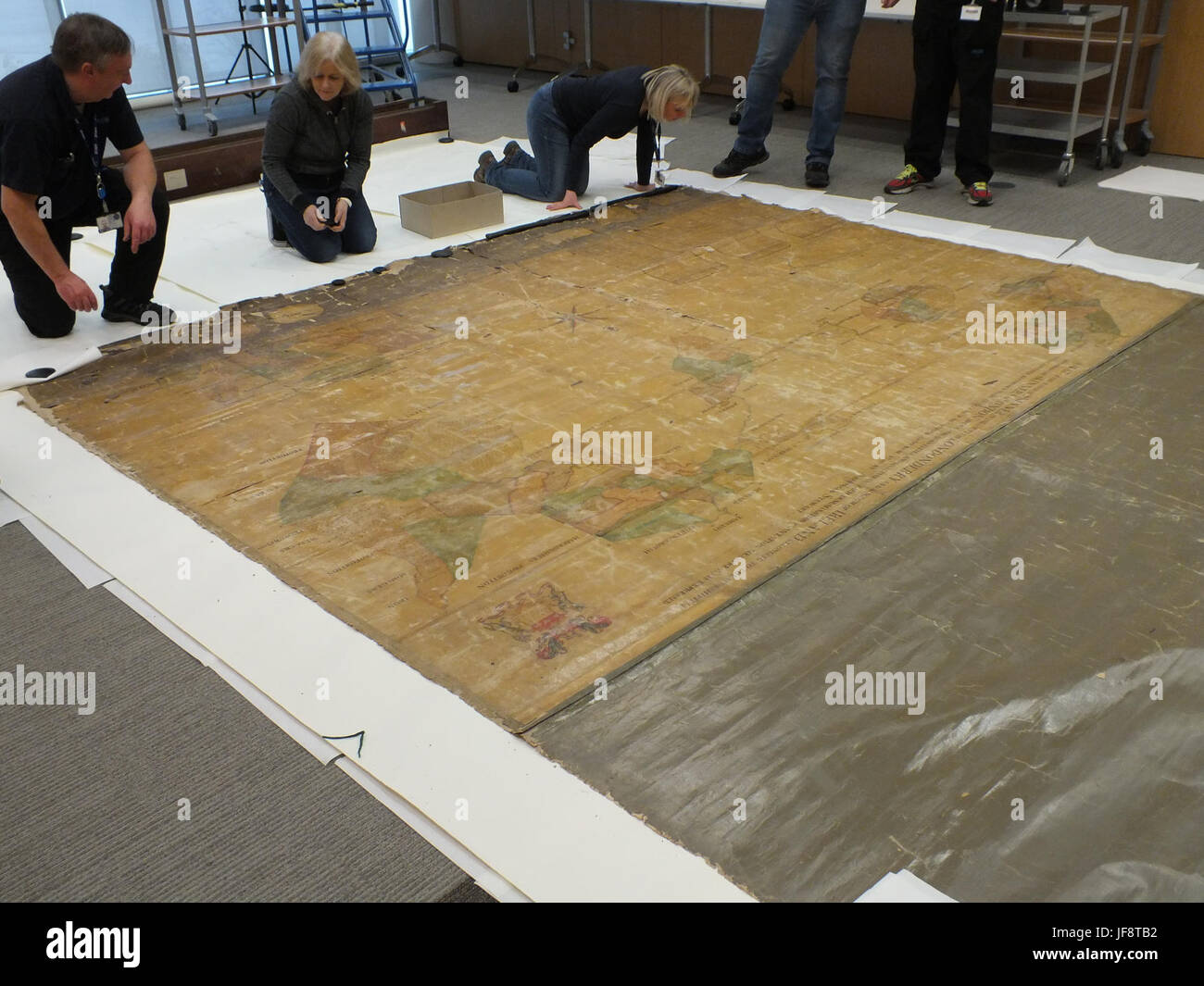 Unrolled map hi-res stock photography and images - Alamy