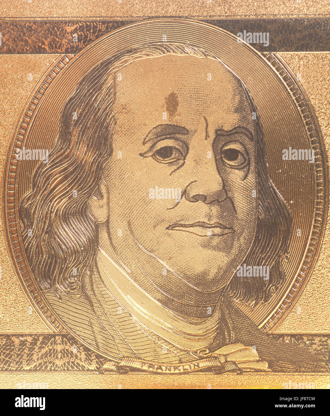 Golden portrait of U.S. president Benjamin Franklin Stock Photo - Alamy