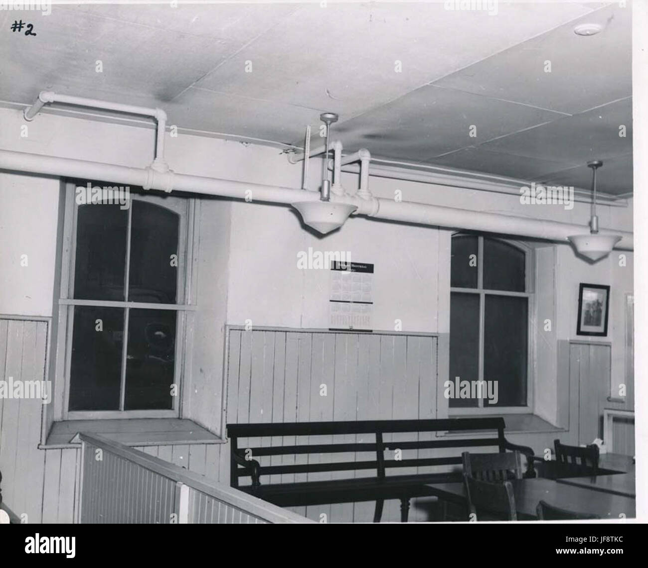 A historical photograph capturing the interior of a courtroom in Sarnia ...