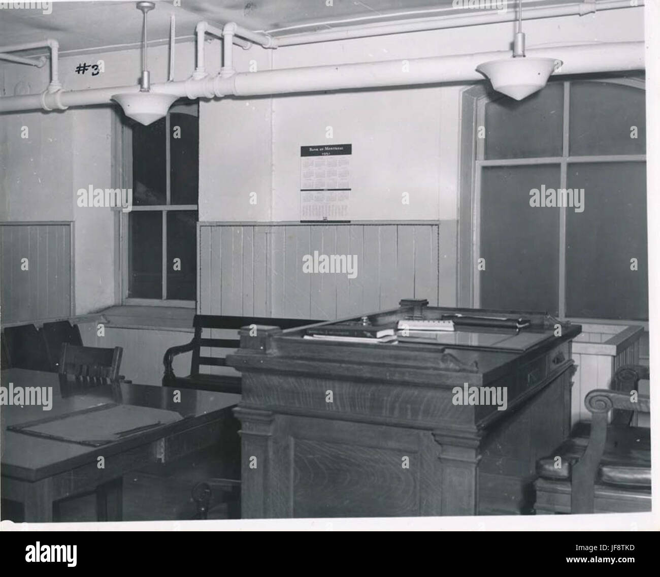 A historic photograph of a courtroom in Sarnia, Ontario, depicting the ...
