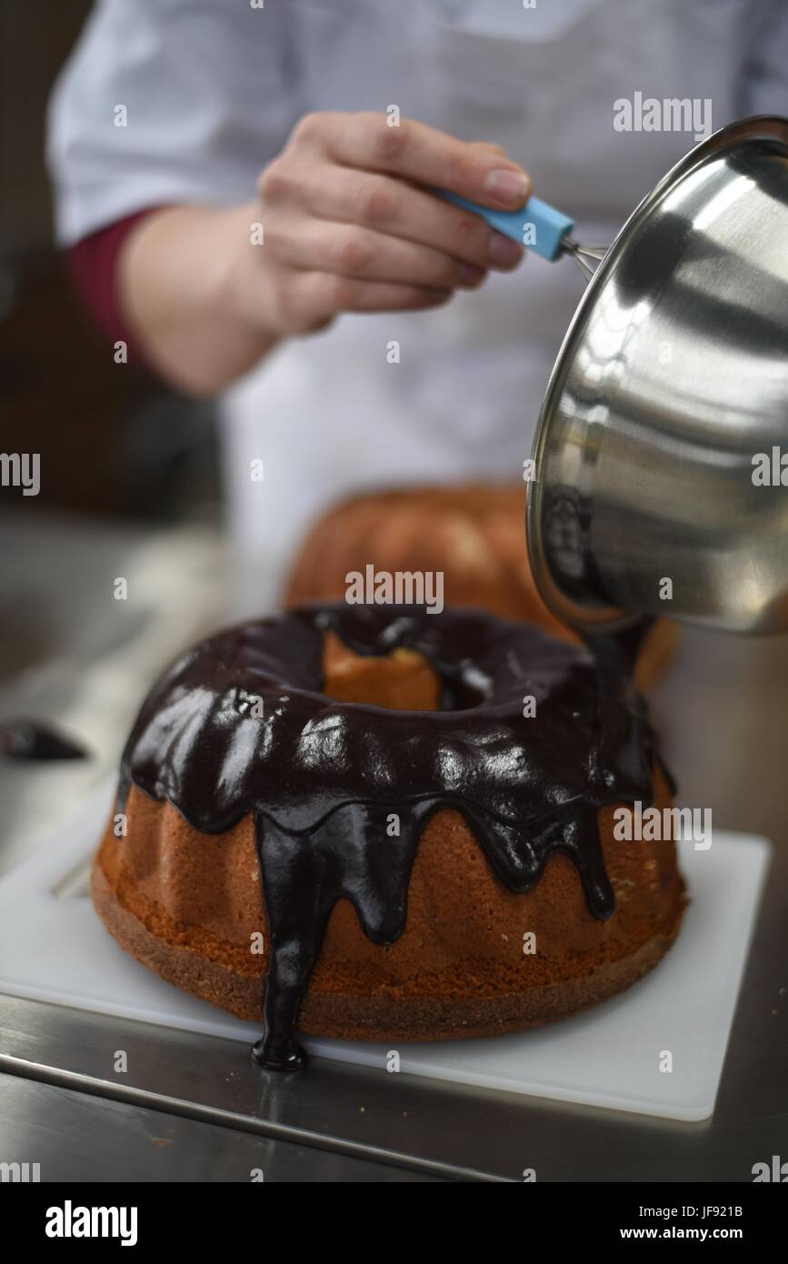 Woman making cake Stock Photo - Alamy