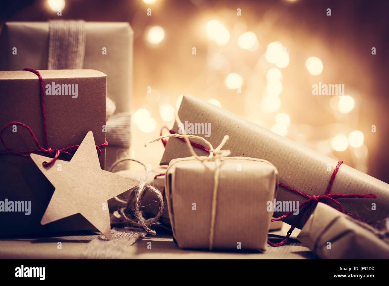 Rustic retro gifts, present boxes on glitter background. Christmas time ...