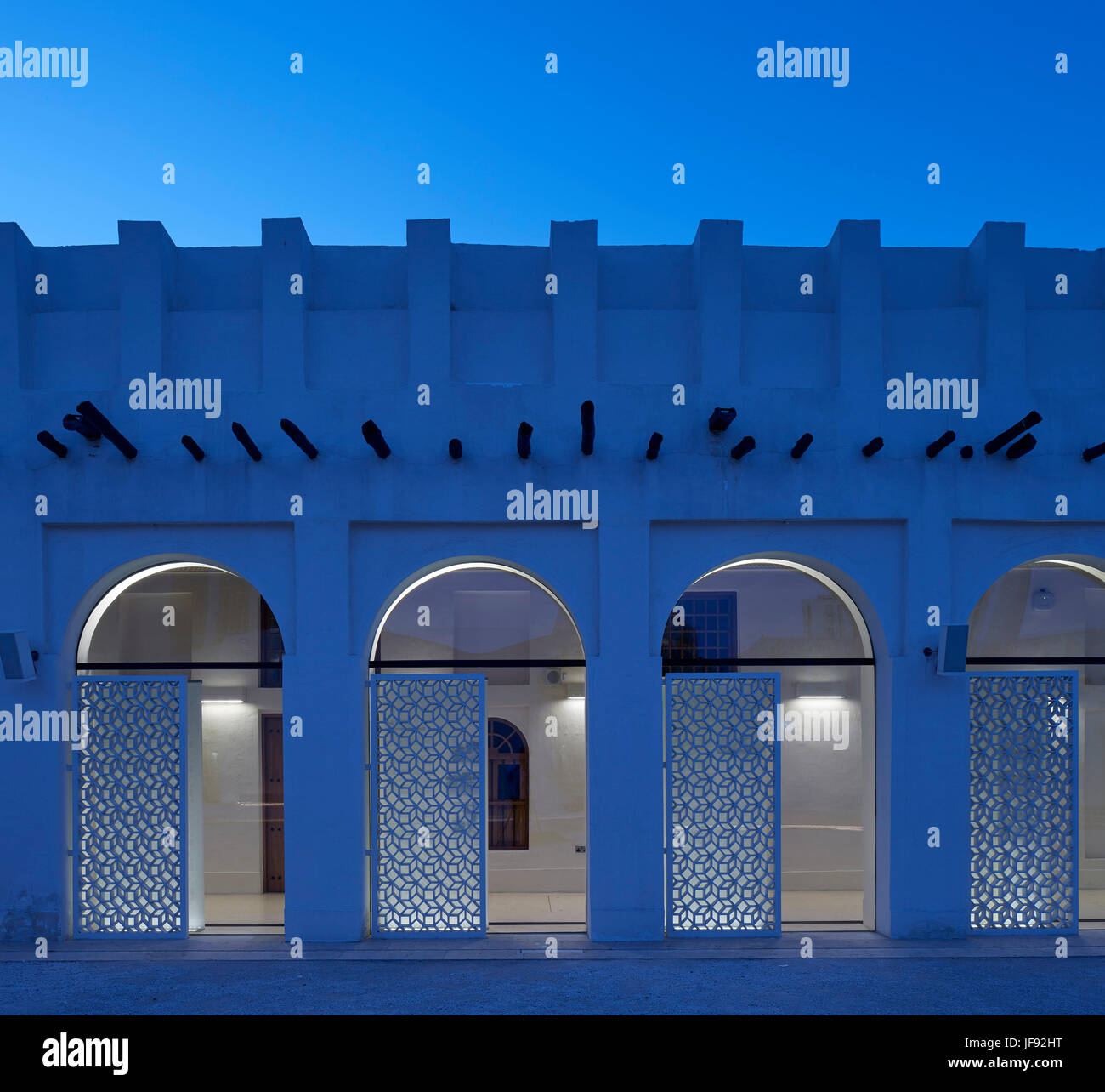 Detail of inner courtyard window at dusk. Bin Jelmood House, Doha ...