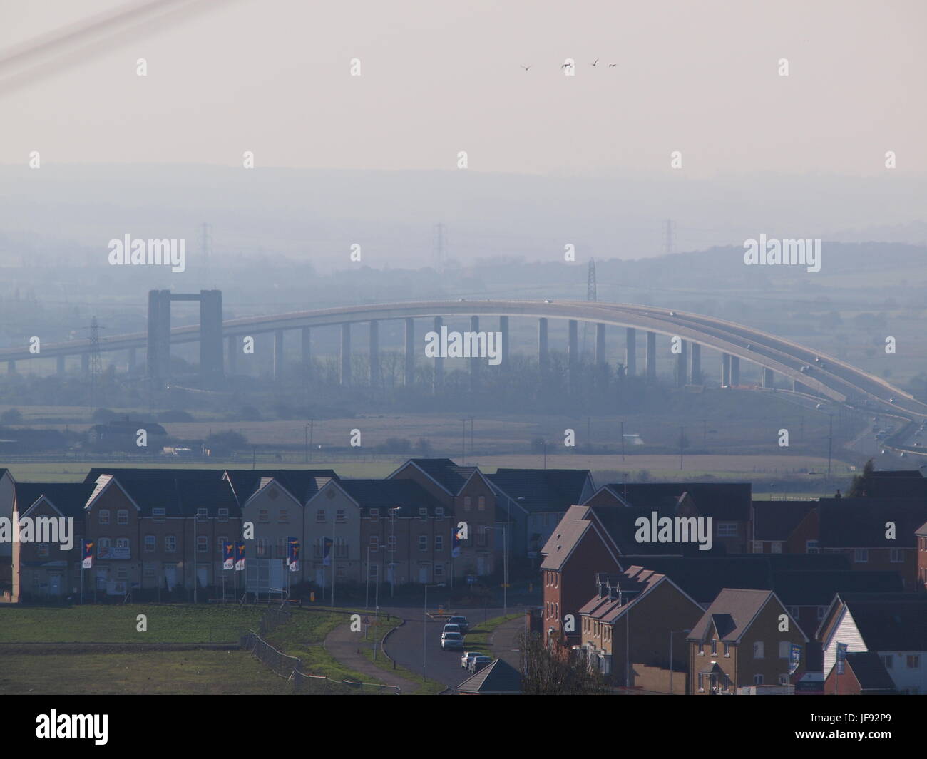 Sheppey Crossing as seen from Minster, with houses in the foreground ...