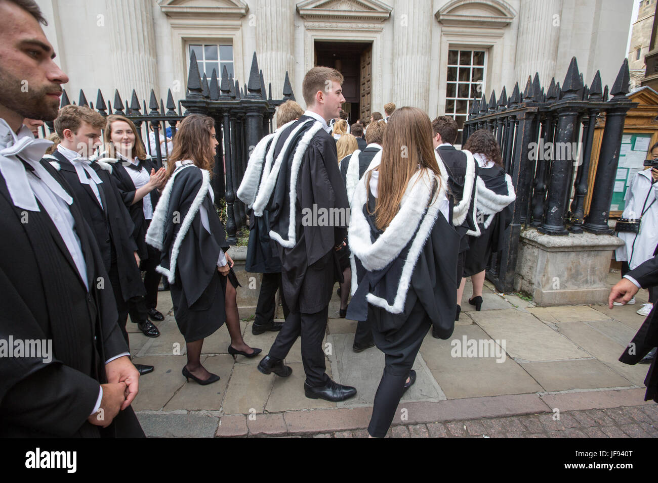 Students from Cambridge University on their way to the Senate House to ...