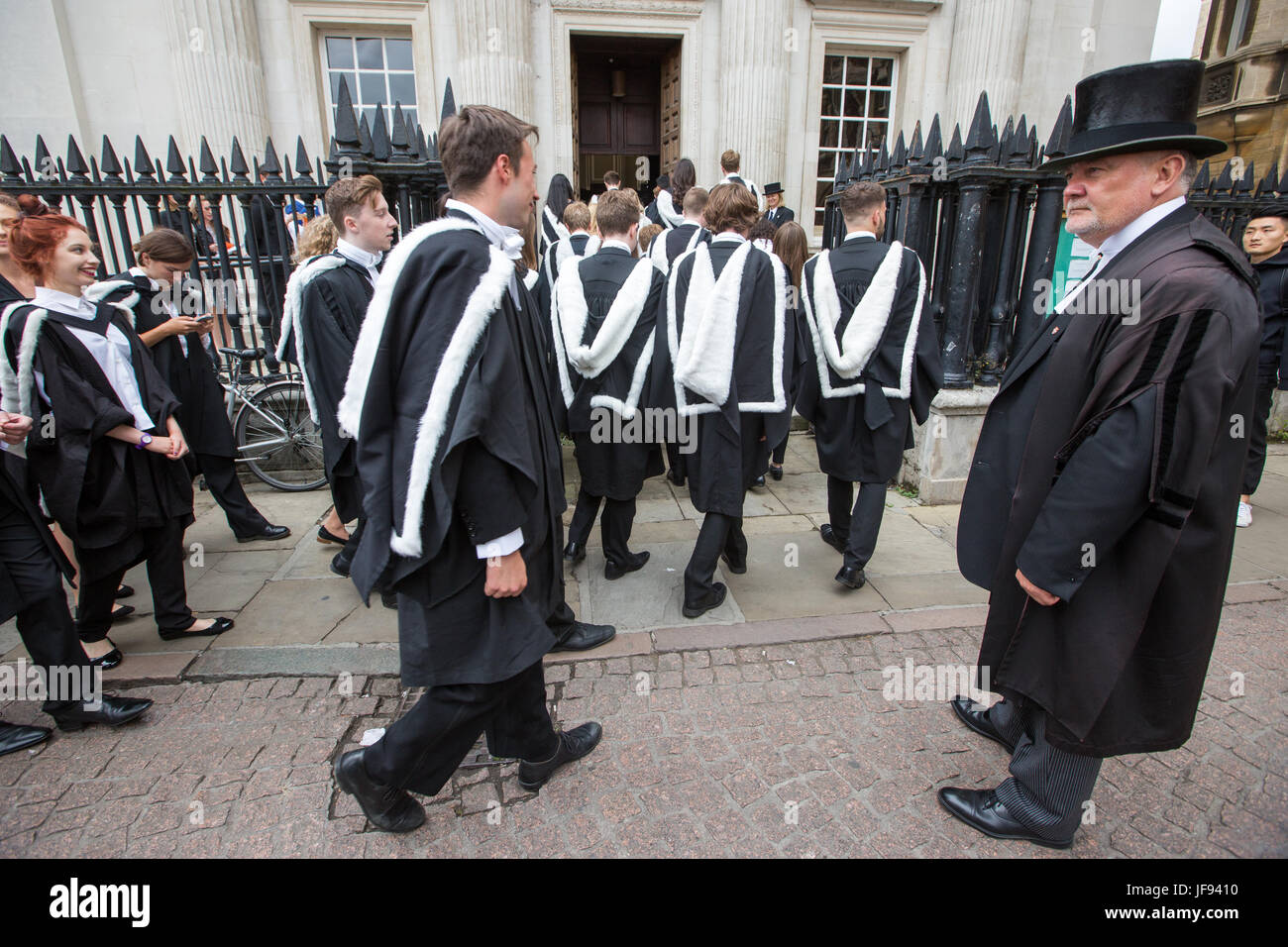 Students from Cambridge University on their way to the Senate House to ...
