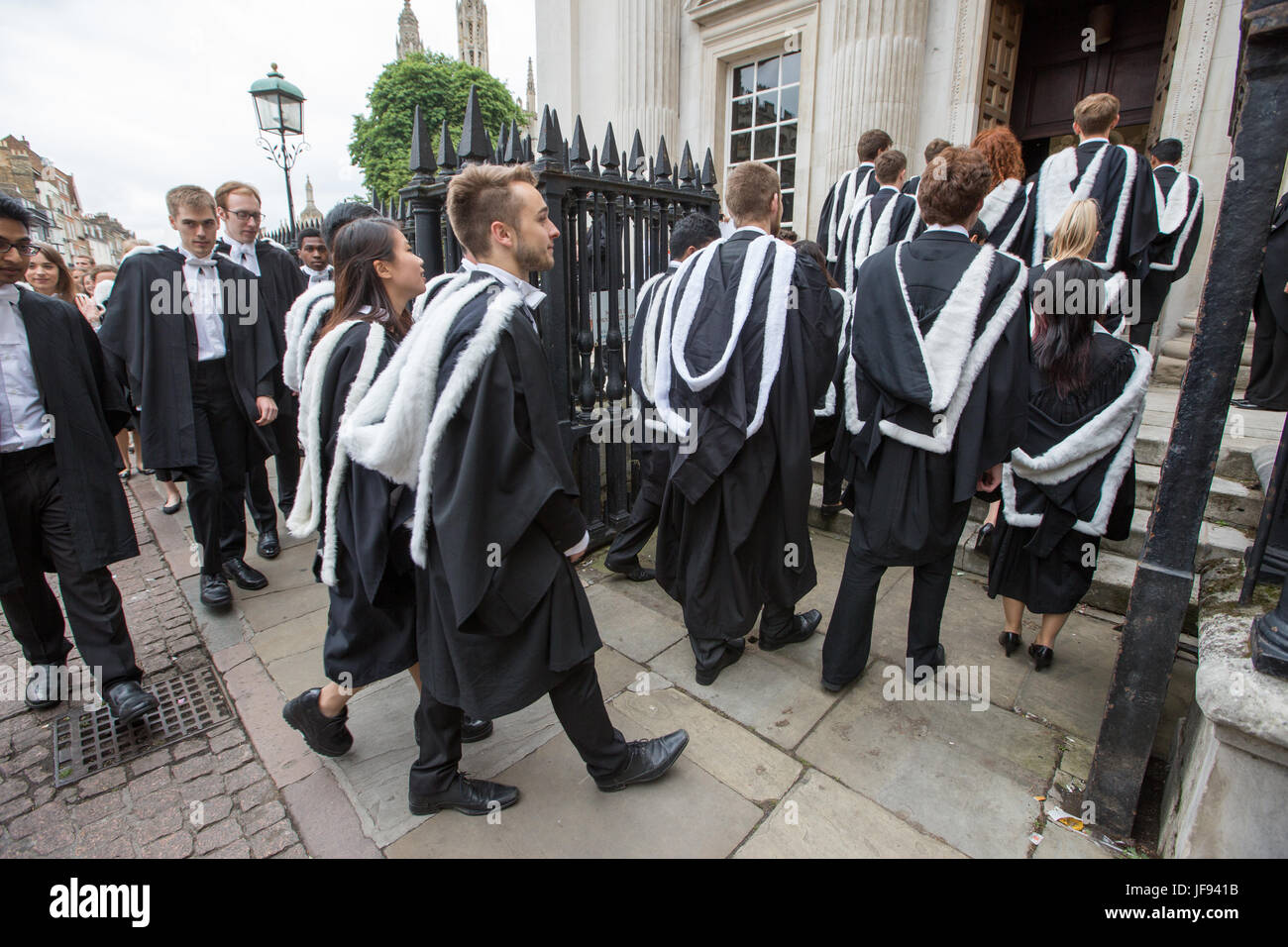 Students from Cambridge University on their way to the Senate House to ...