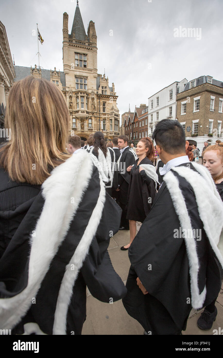 Students from Cambridge University on their way to the Senate House to ...