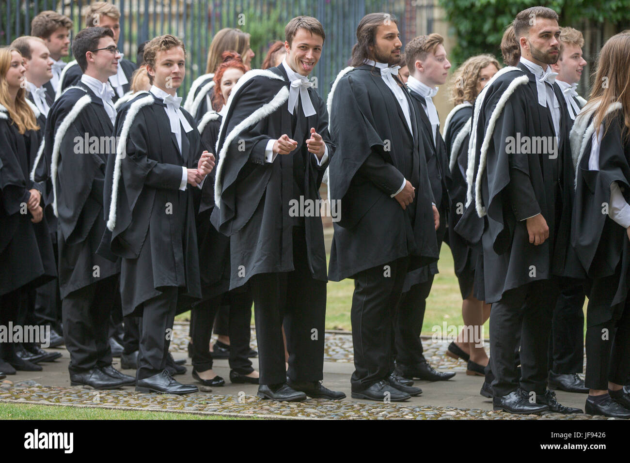 Students from Cambridge University on their way to the Senate House to ...