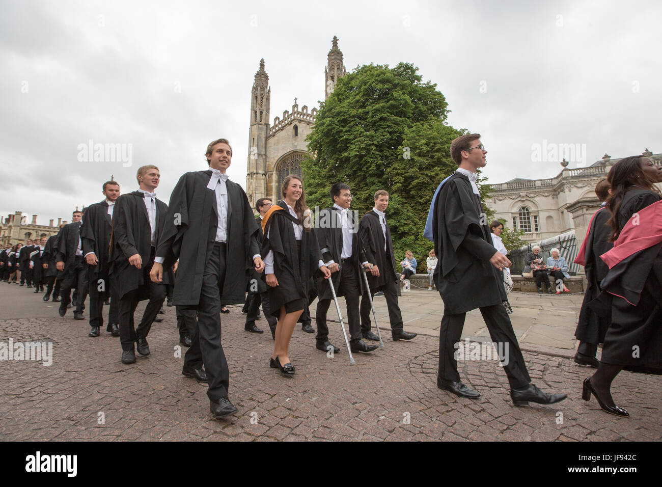 Students from Cambridge University on their way to the Senate House to ...