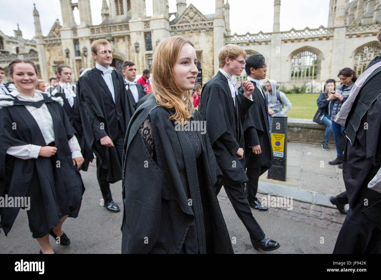 Students from Cambridge University on their way to the Senate House to ...