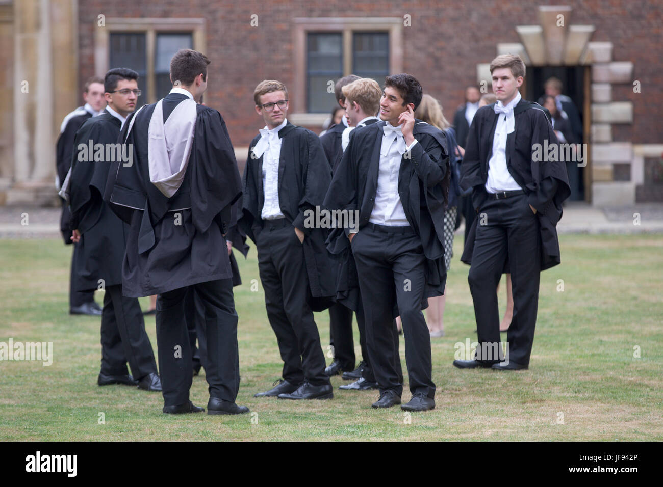 University undergraduates in gowns hi-res stock photography and images ...