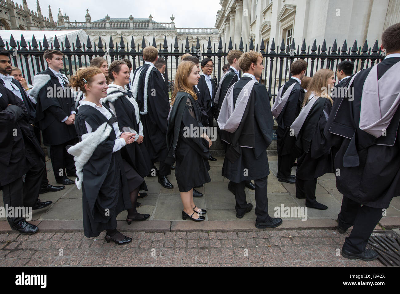 Students from Cambridge University on their way to the Senate House to ...