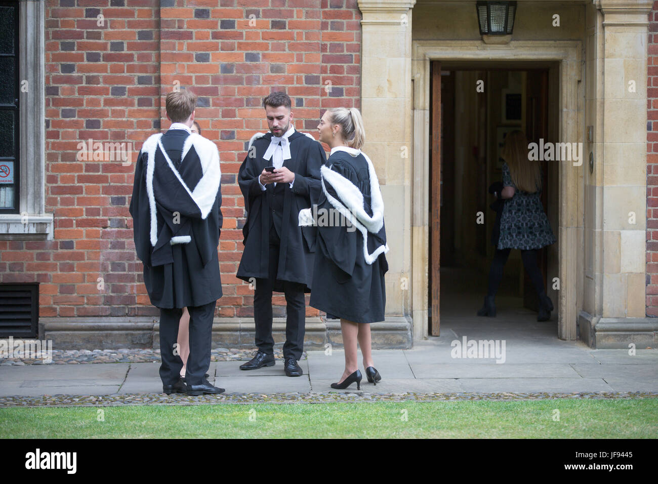 Students from Cambridge University on their way to the Senate House to ...
