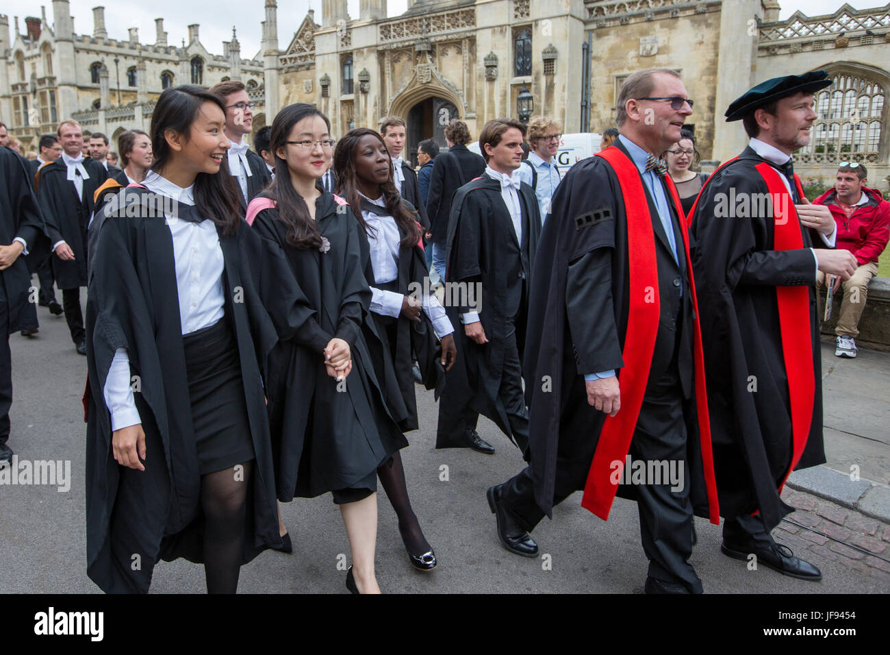 Students from Cambridge University on their way to the Senate House to ...