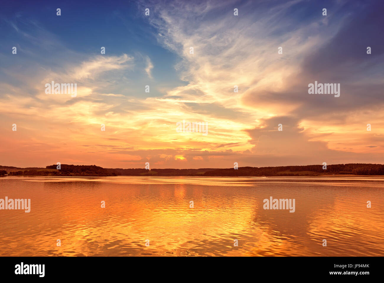 sunset over lake with colorful sky background. Beautiful summer sunrise ...