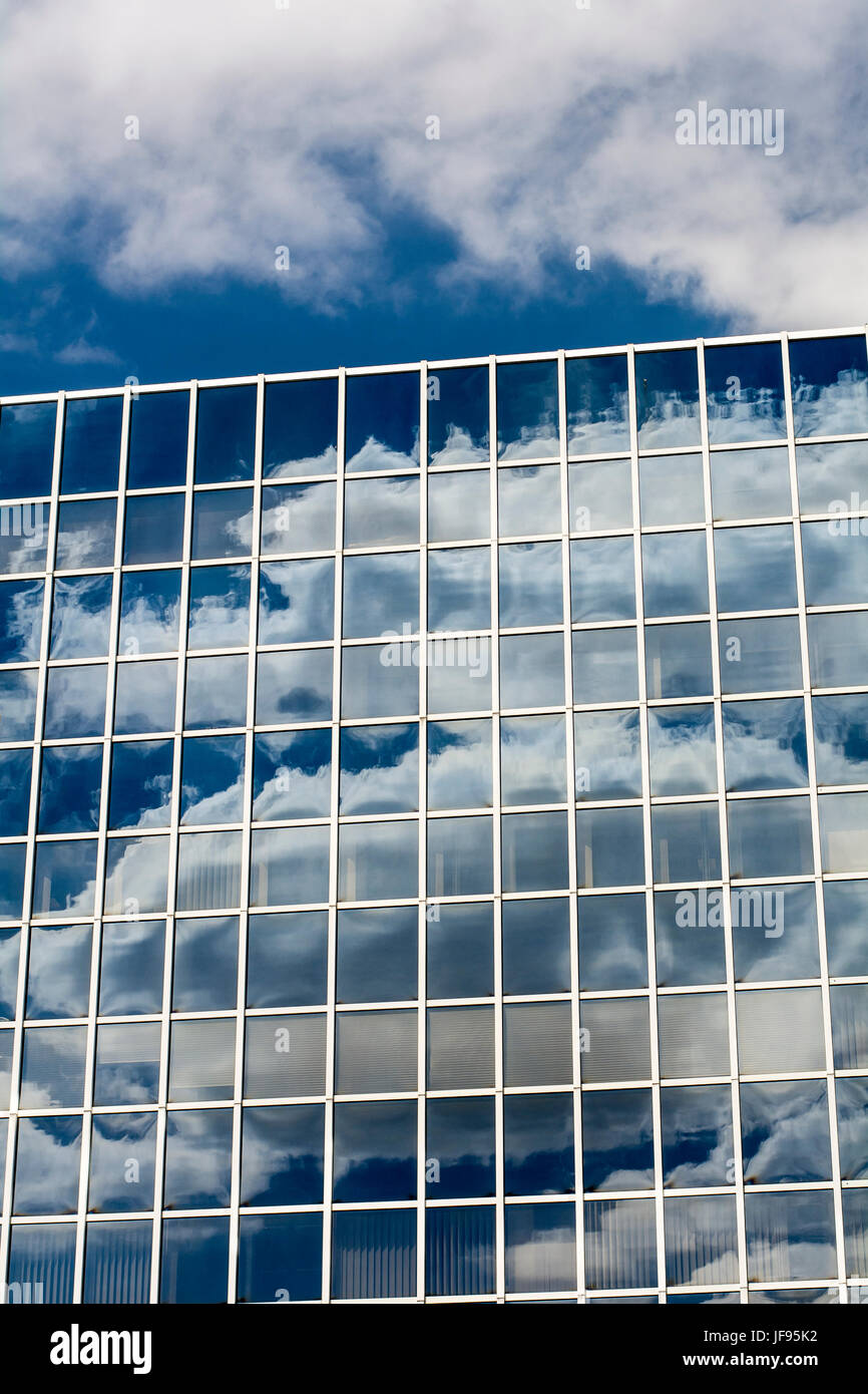 Clouds and sky reflected in windows Stock Photo - Alamy