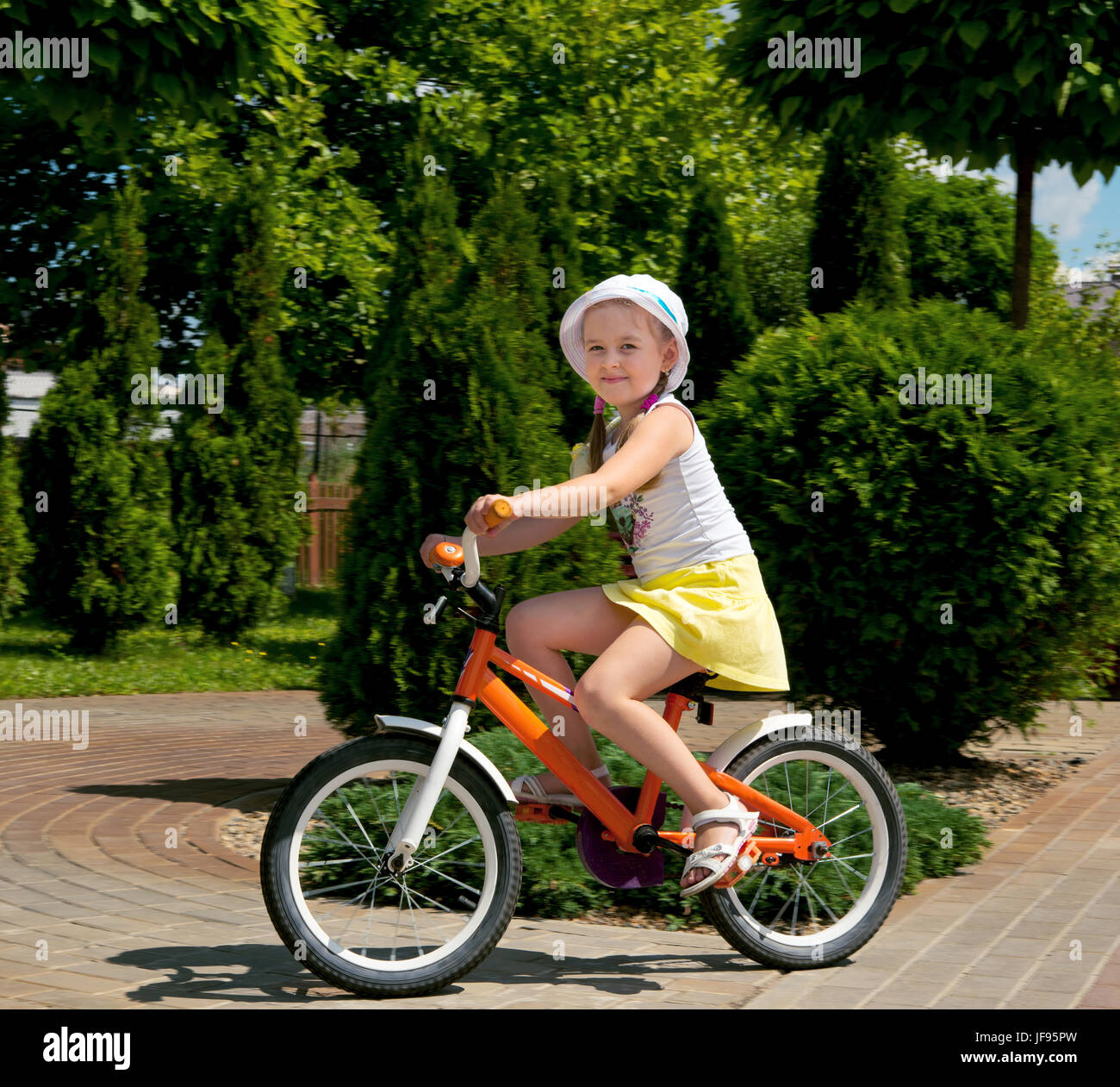 girl on a Bicycle in the Park Stock Photo - Alamy