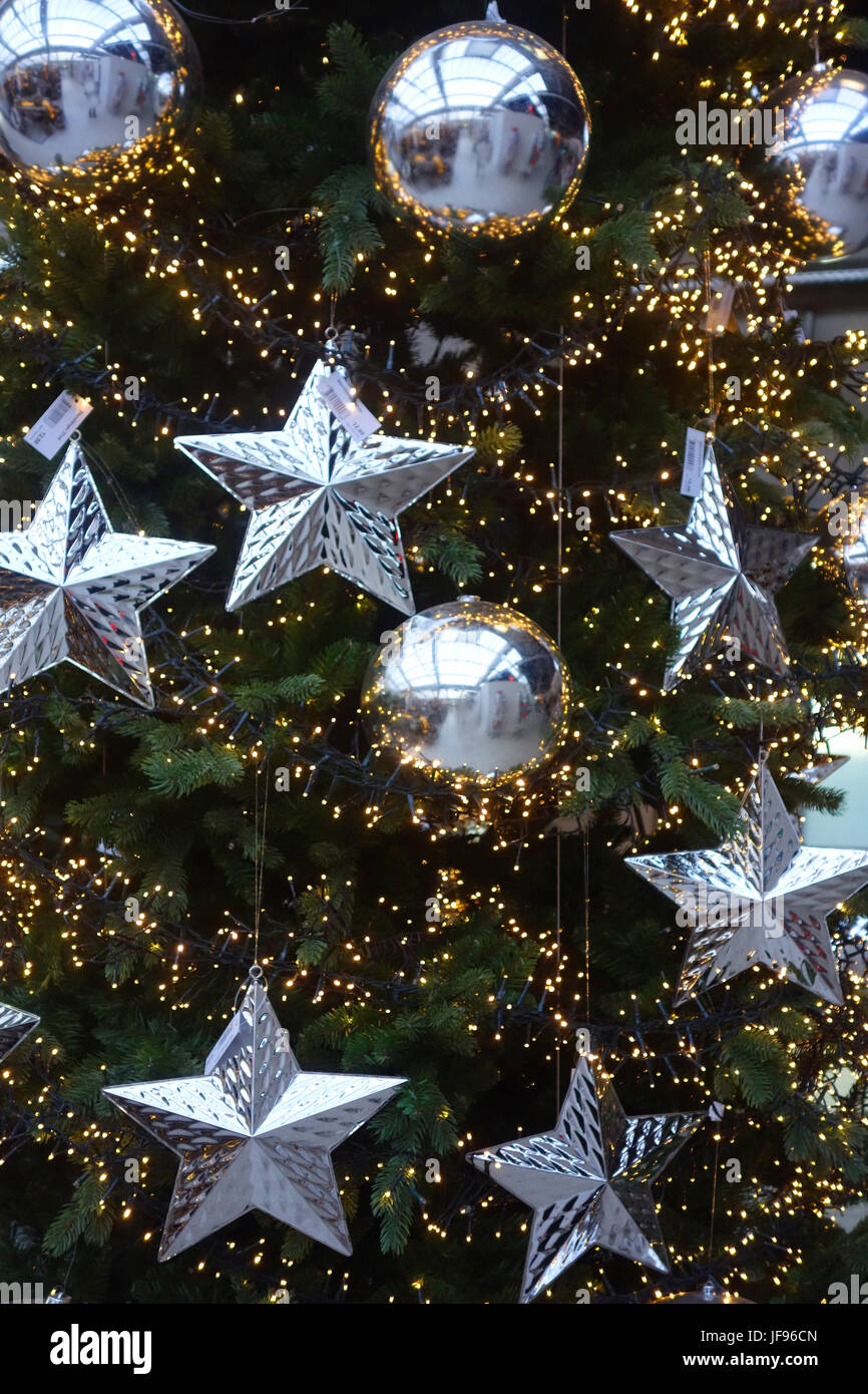 Christmas tree with silver balls and stars Stock Photo - Alamy