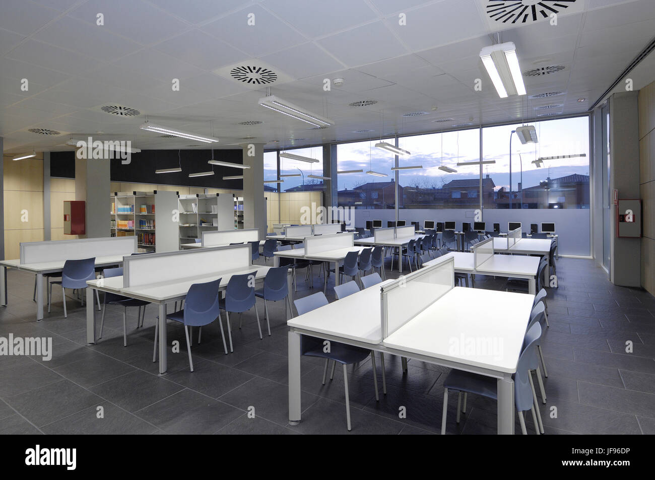 an empty university library, with chairs and tables for study Stock ...